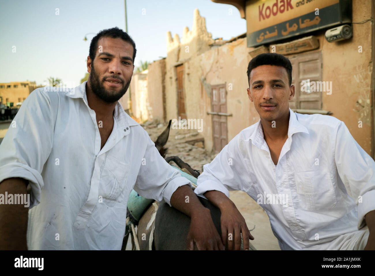 Typical Siwan males wearing their traditional thawb Stock Photo - Alamy