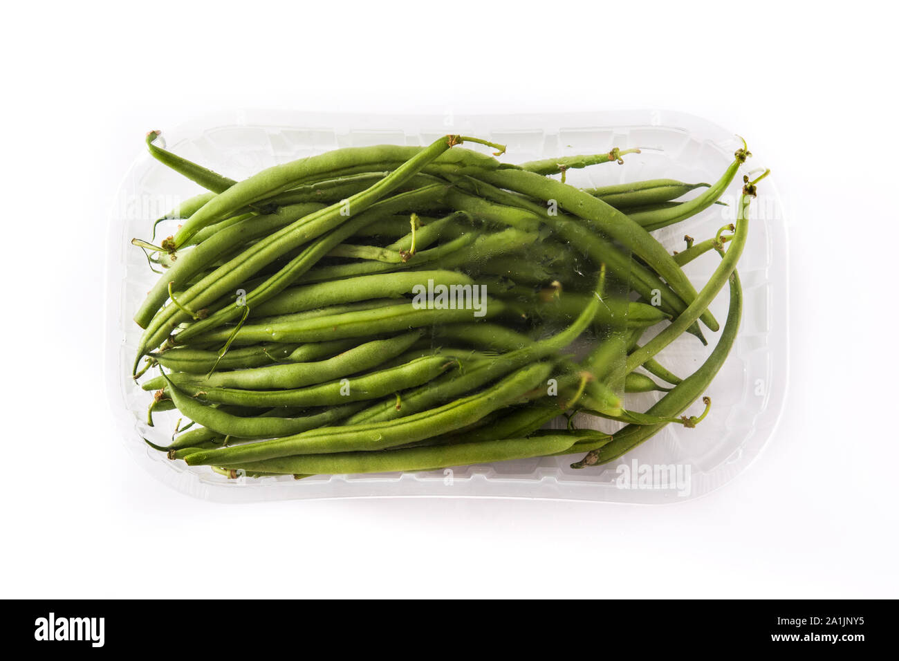 Green beans packaged in plastic isolated on white background Stock ...