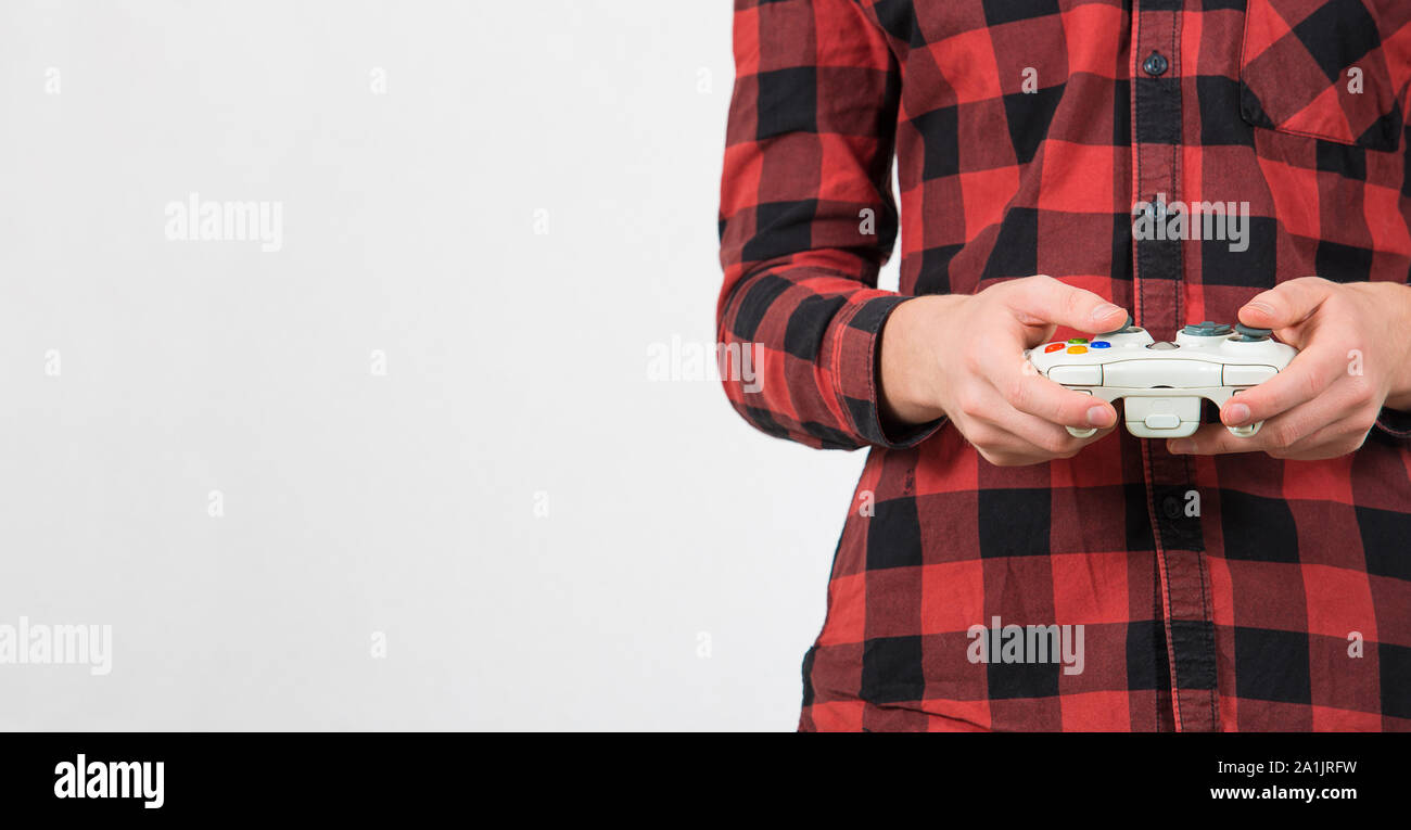 Close up of teenage boy hands playing video games holding a joystick ...