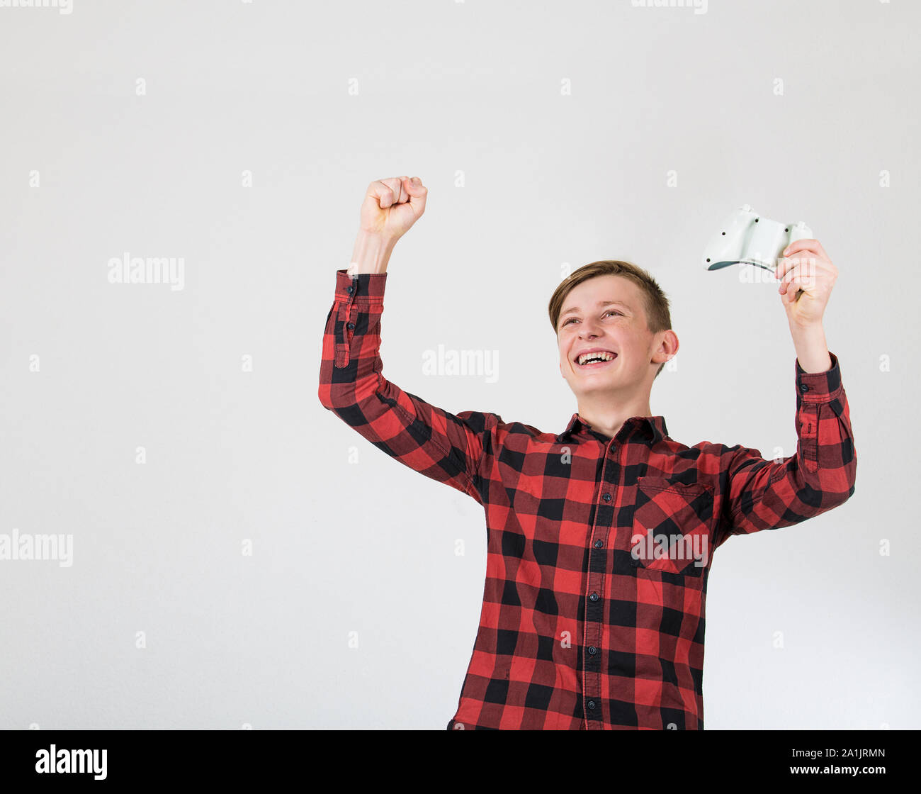Boy celebrating video game hi-res stock photography and images - Alamy