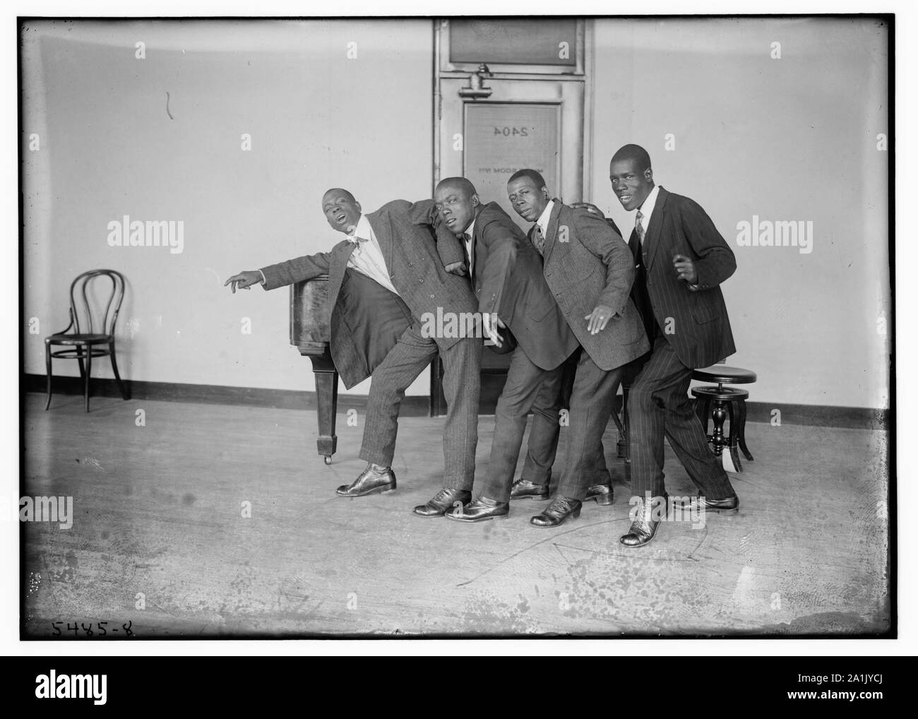 Negro singing and dancing group Stock Photo - Alamy