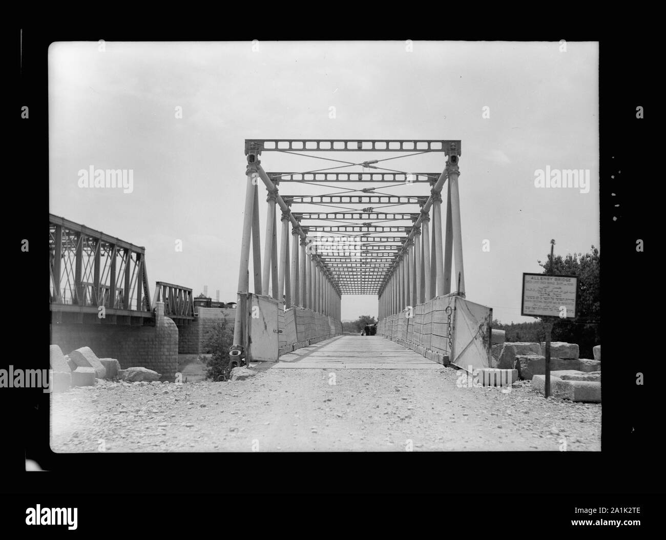 New Allenby Bridge over Jordan, showing old bridge also Stock Photo - Alamy