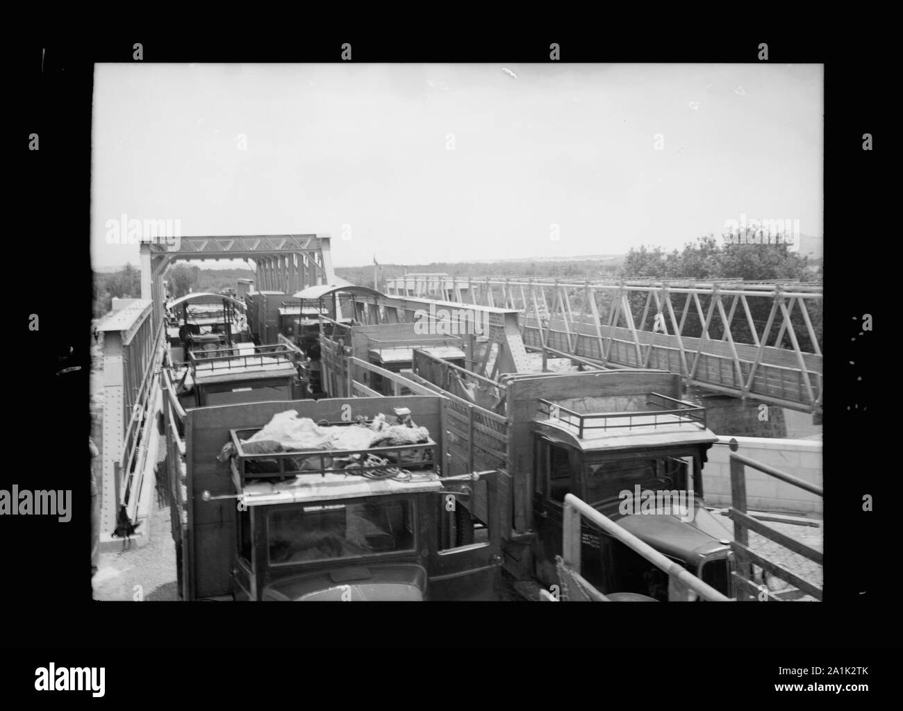 New Allenby Bridge over Jordan, showing old bridge also Stock Photo - Alamy
