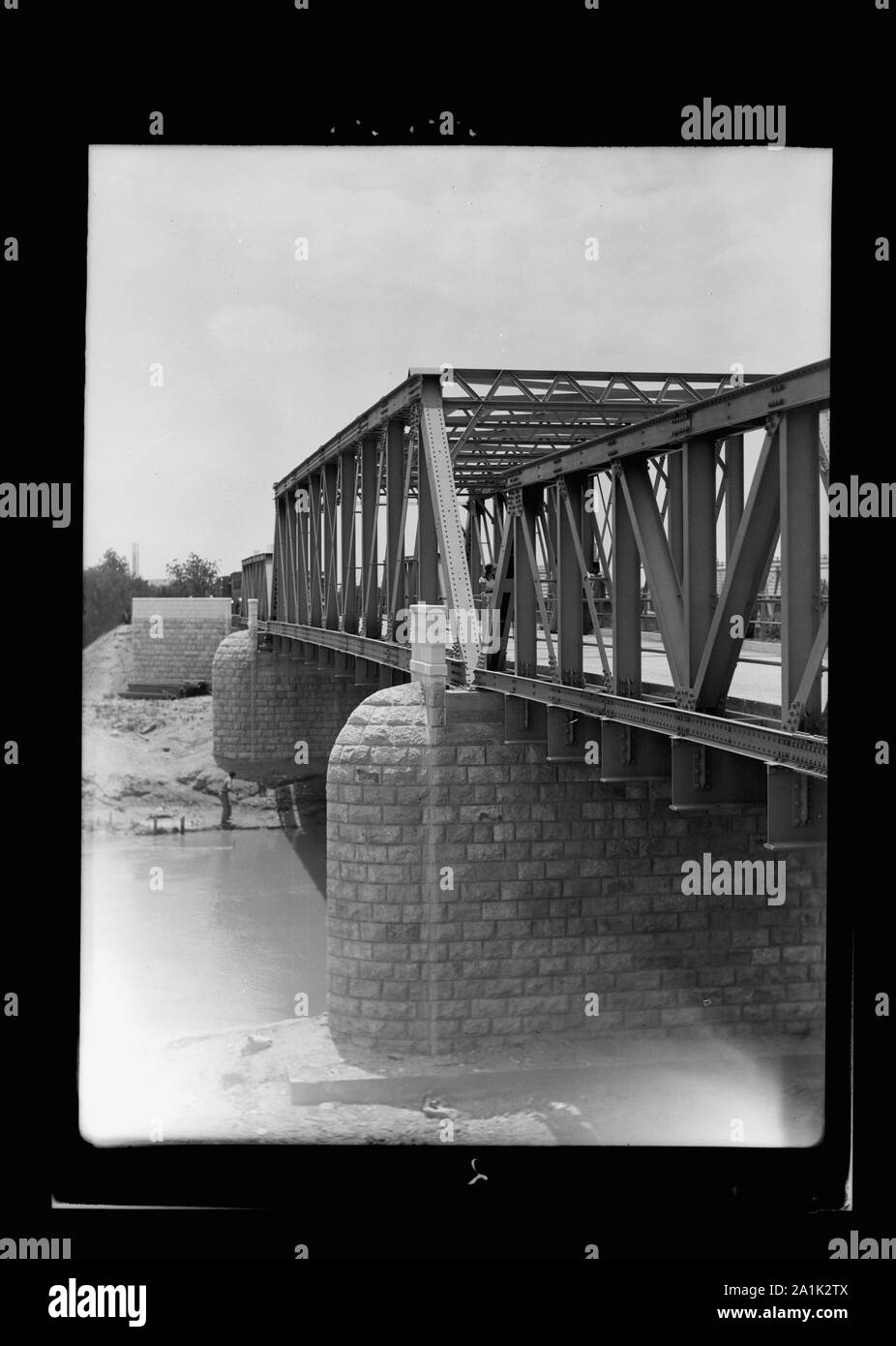 New Allenby Bridge over Jordan, showing old bridge also Stock Photo - Alamy