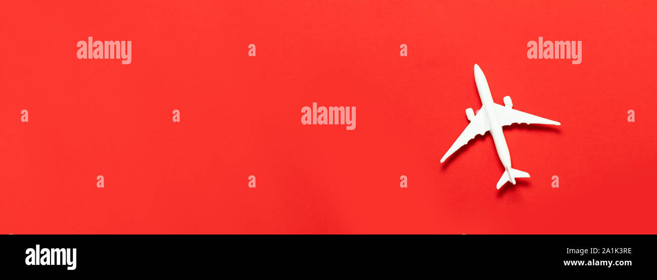 Model plane, airplane on red background. Flat lay design concept Stock ...
