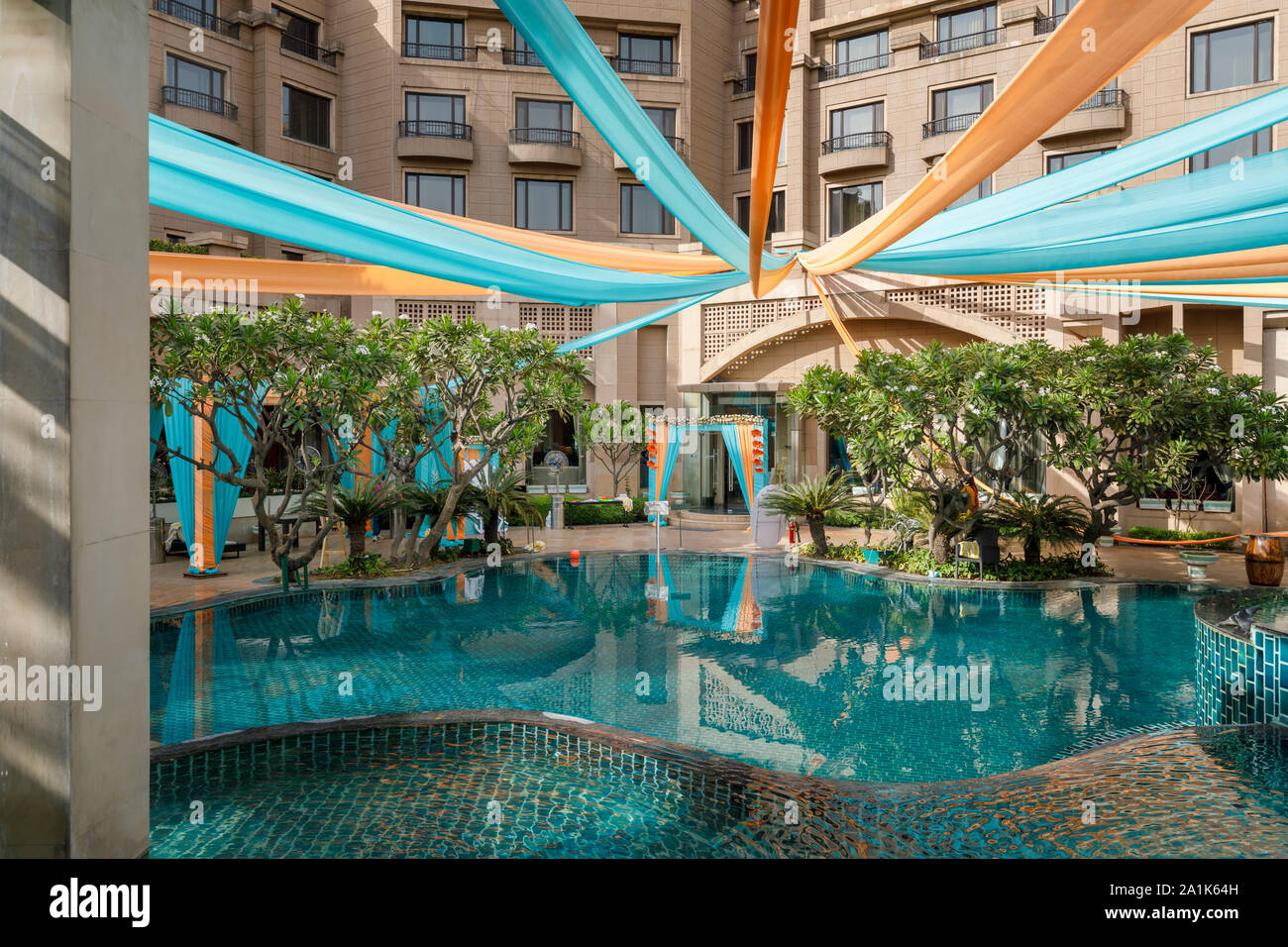Modern swimming pool at the Radisson Blu Plaza Hotel at Mahipalpur near ...