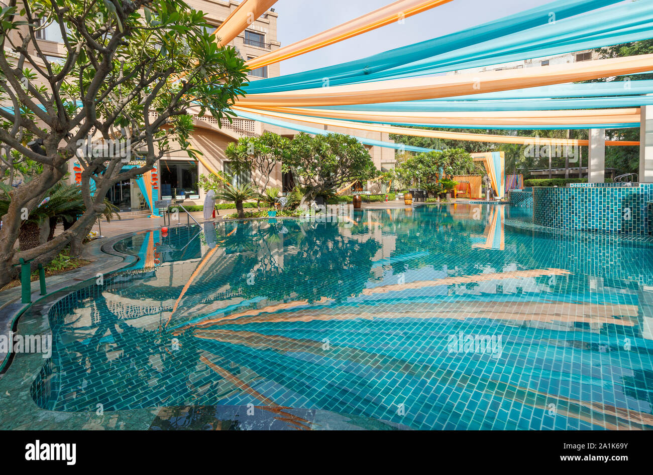 Modern swimming pool at the Radisson Blu Plaza Hotel at Mahipalpur near ...