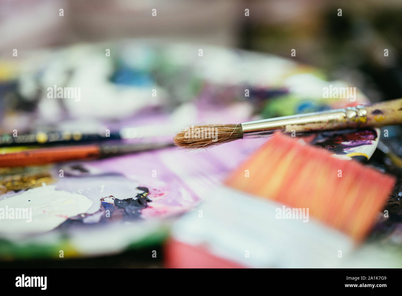 Artist paint brush on painting background. Painting therapy Stock Photo ...