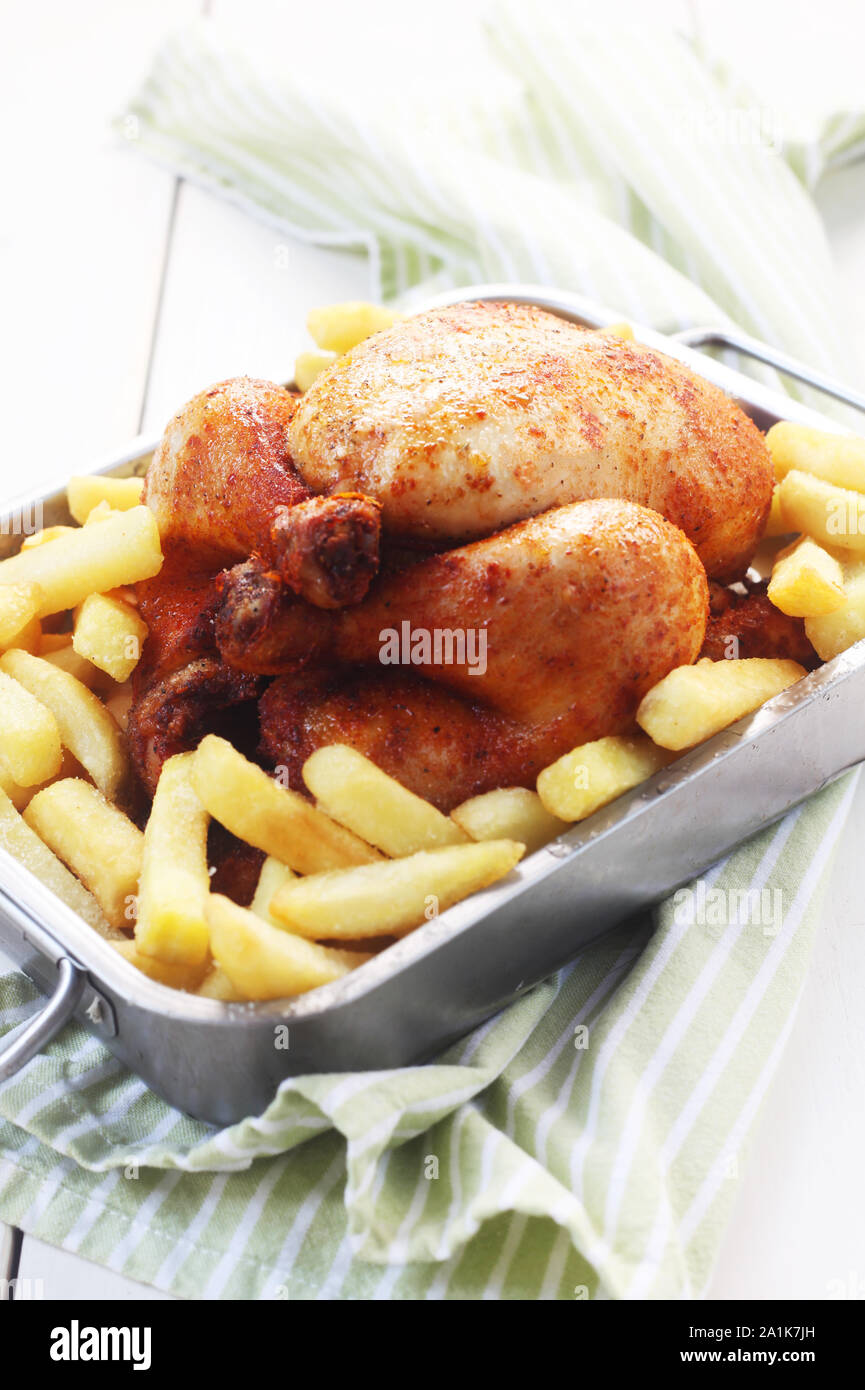 Roast Chicken With Chips Stock Photo - Alamy
