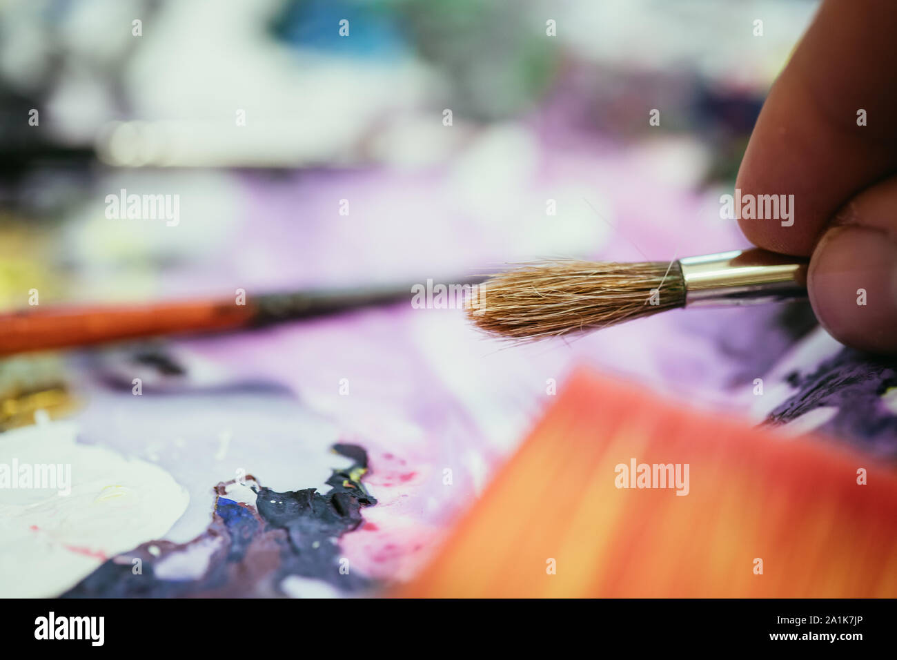 Artist paint brush on painting background. Painting therapy Stock Photo ...
