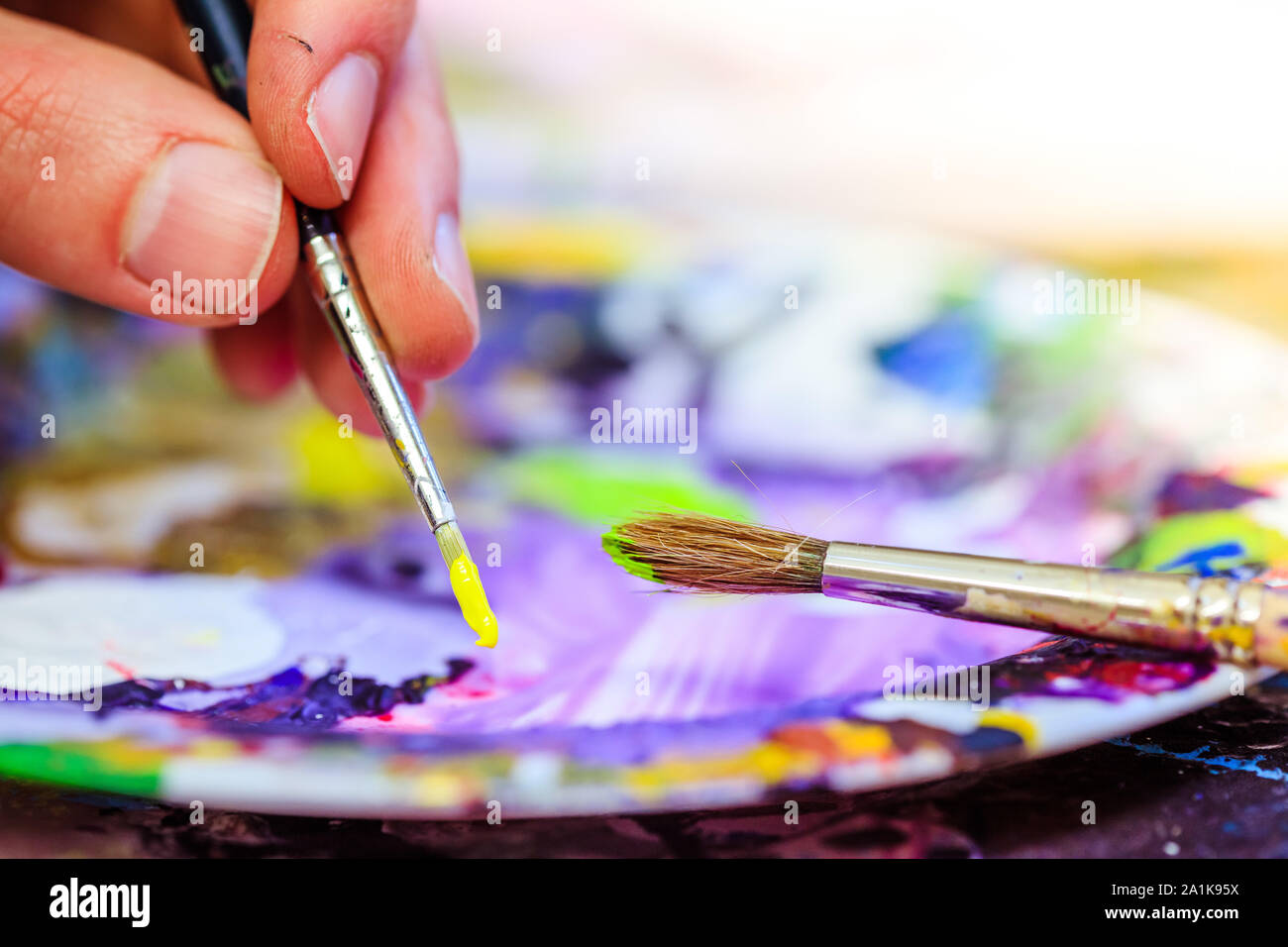 Artist paint brush on painting background. Painting therapy Stock Photo ...