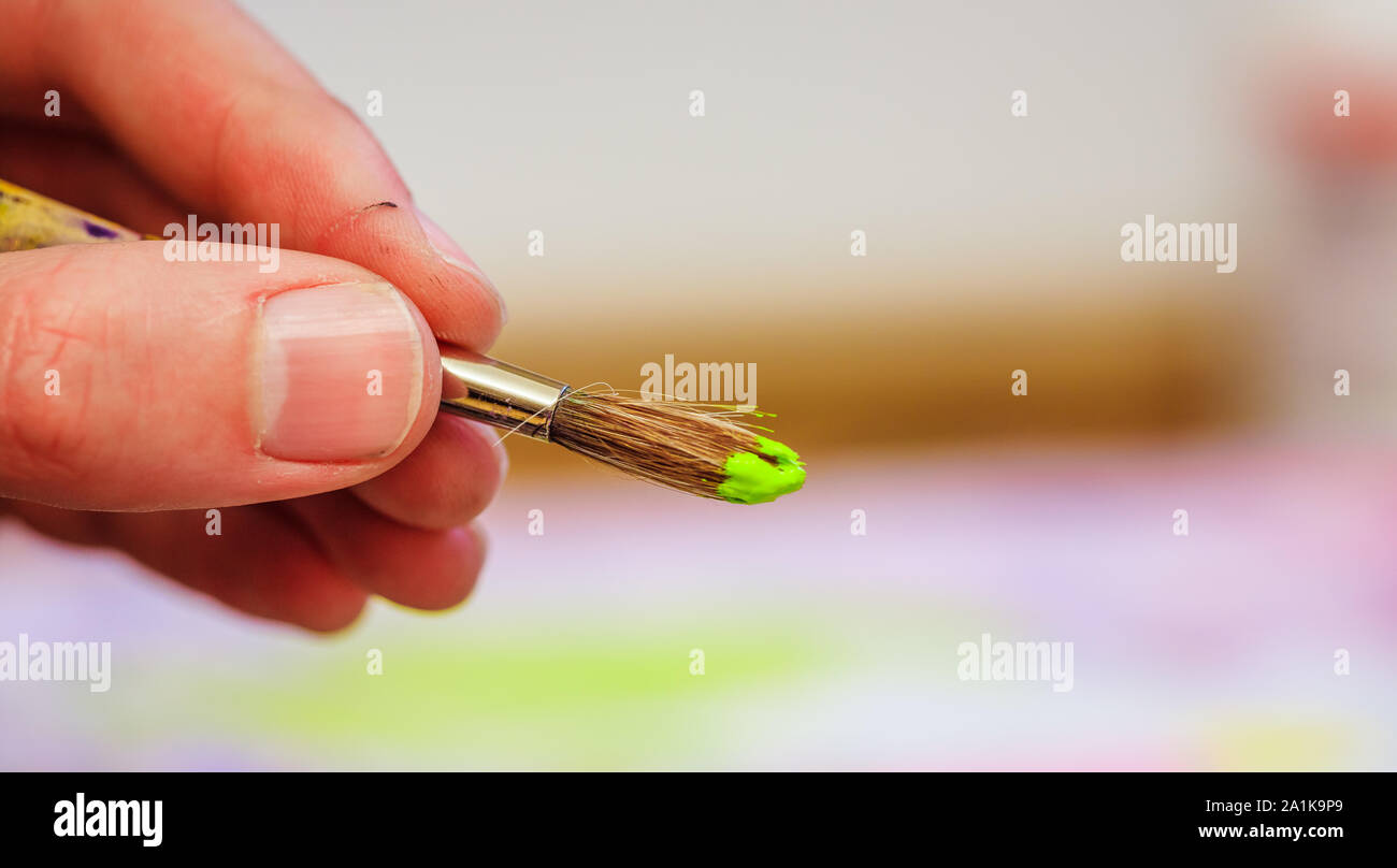 Artist paint brush on painting background. Painting therapy Stock Photo ...