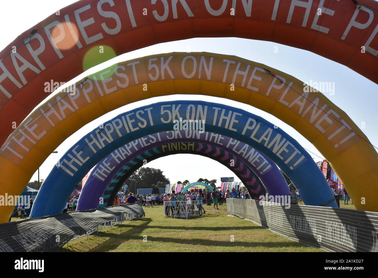 This photograph was taken at the 2019 Color Run 5K road race. These ...