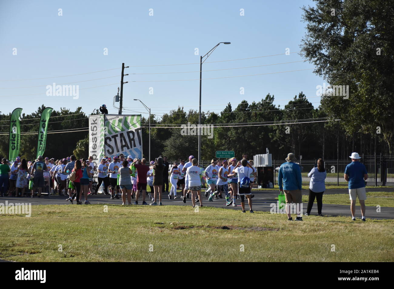 This photograph was taken at the 2019 Color Run 5K road race. These ...