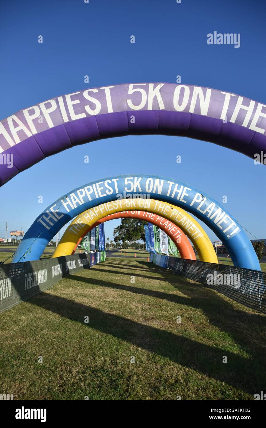 This photograph was taken at the 2019 Color Run 5K road race. These ...