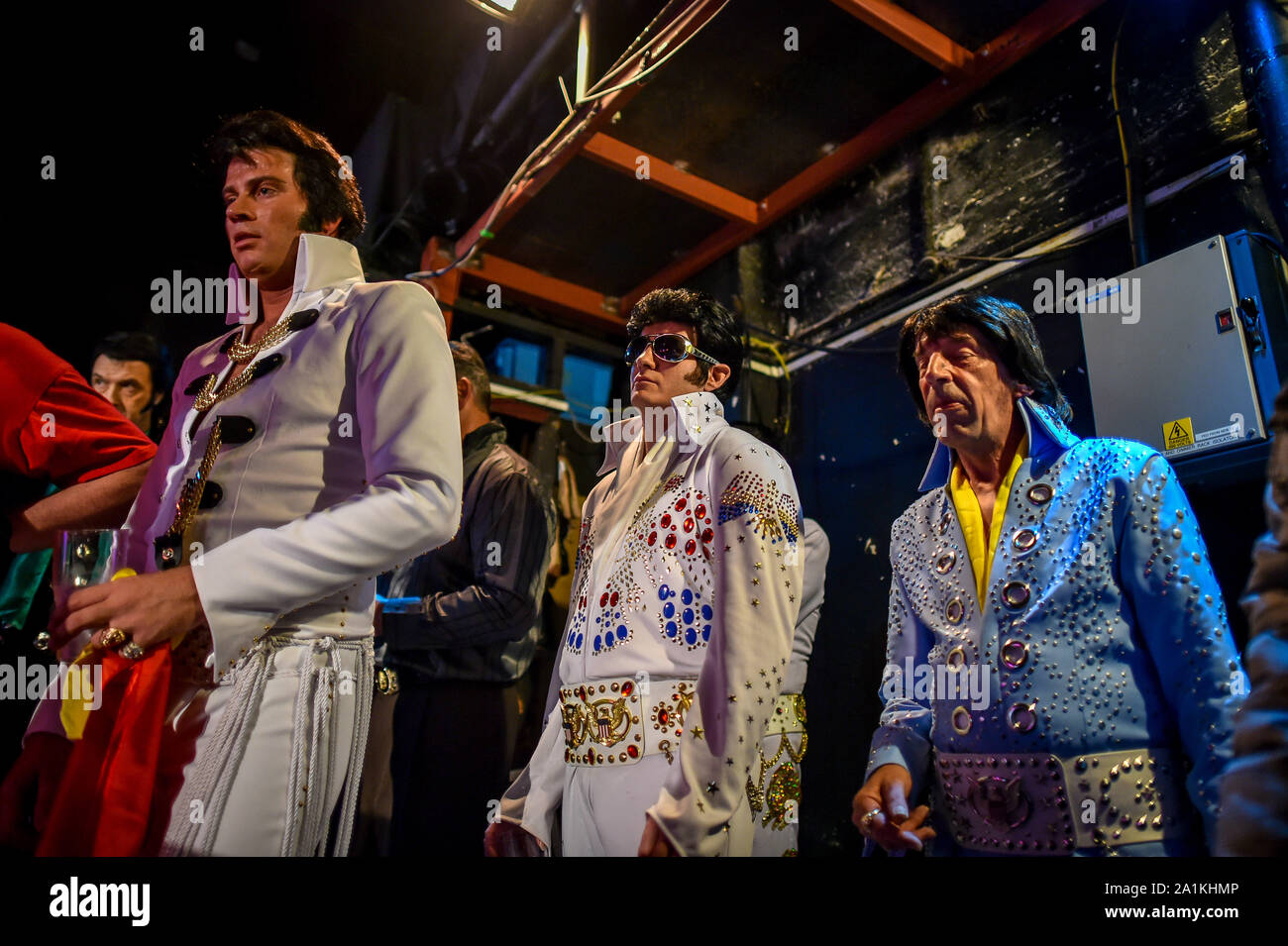 Elvis' watch other performers from the wings onstage at the Grand ...