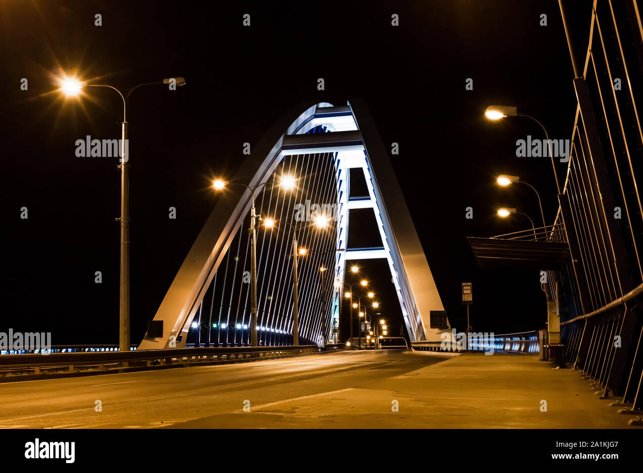 Construction of the Apollo bridge over river Danube, enlighted by night ...