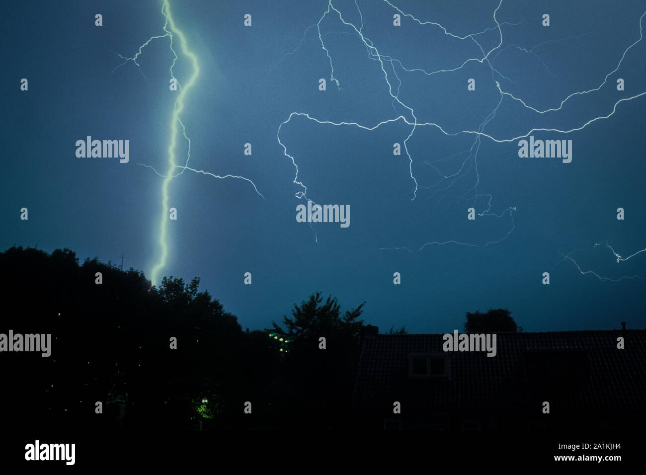 Lightning bolt strikes down to earth. Many small lightning channels can ...