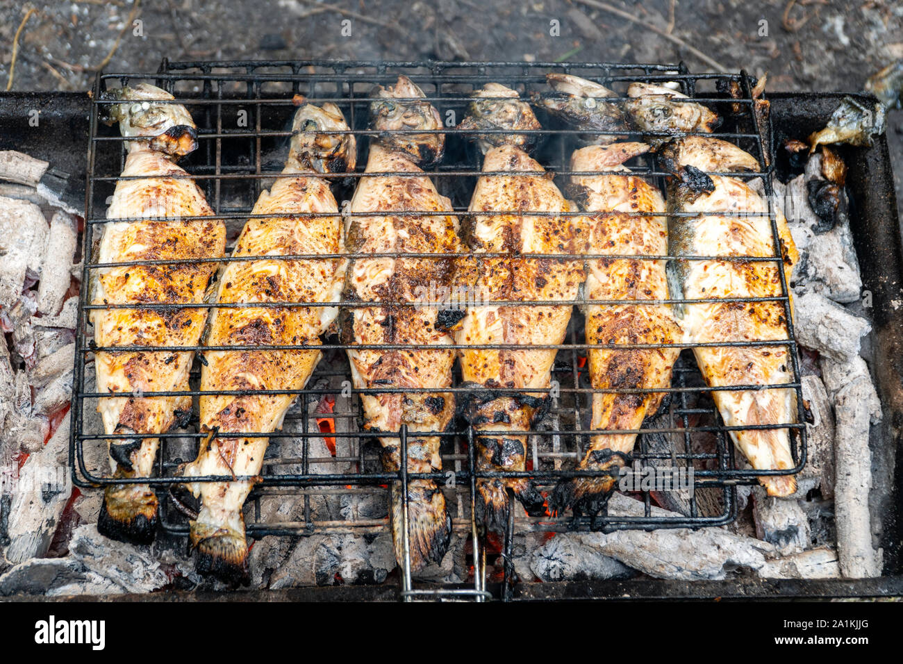Barbecue of fish hi-res stock photography and images - Alamy