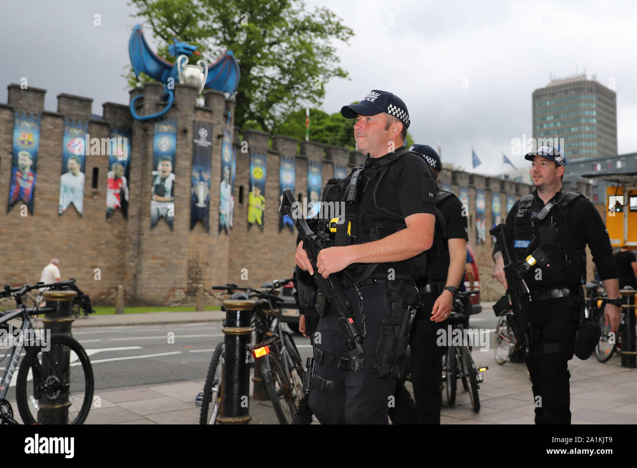 Armed Police patrol Cardiff Castle - ahead of tomorrows UEFA Champions ...