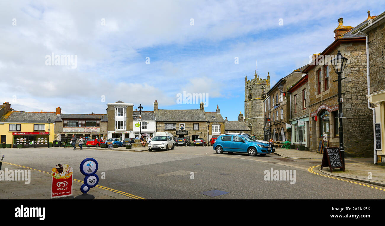 The market square, parish church and shops and pubs at St Just in ...
