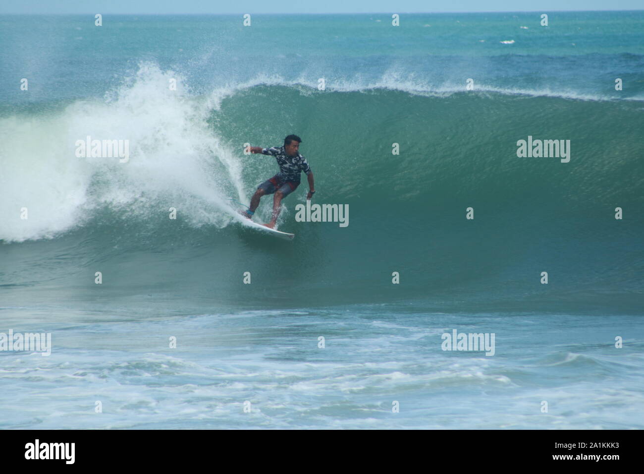Kuta Beach, Bali 2019. Local surfer spent the day with wave Stock Photo ...