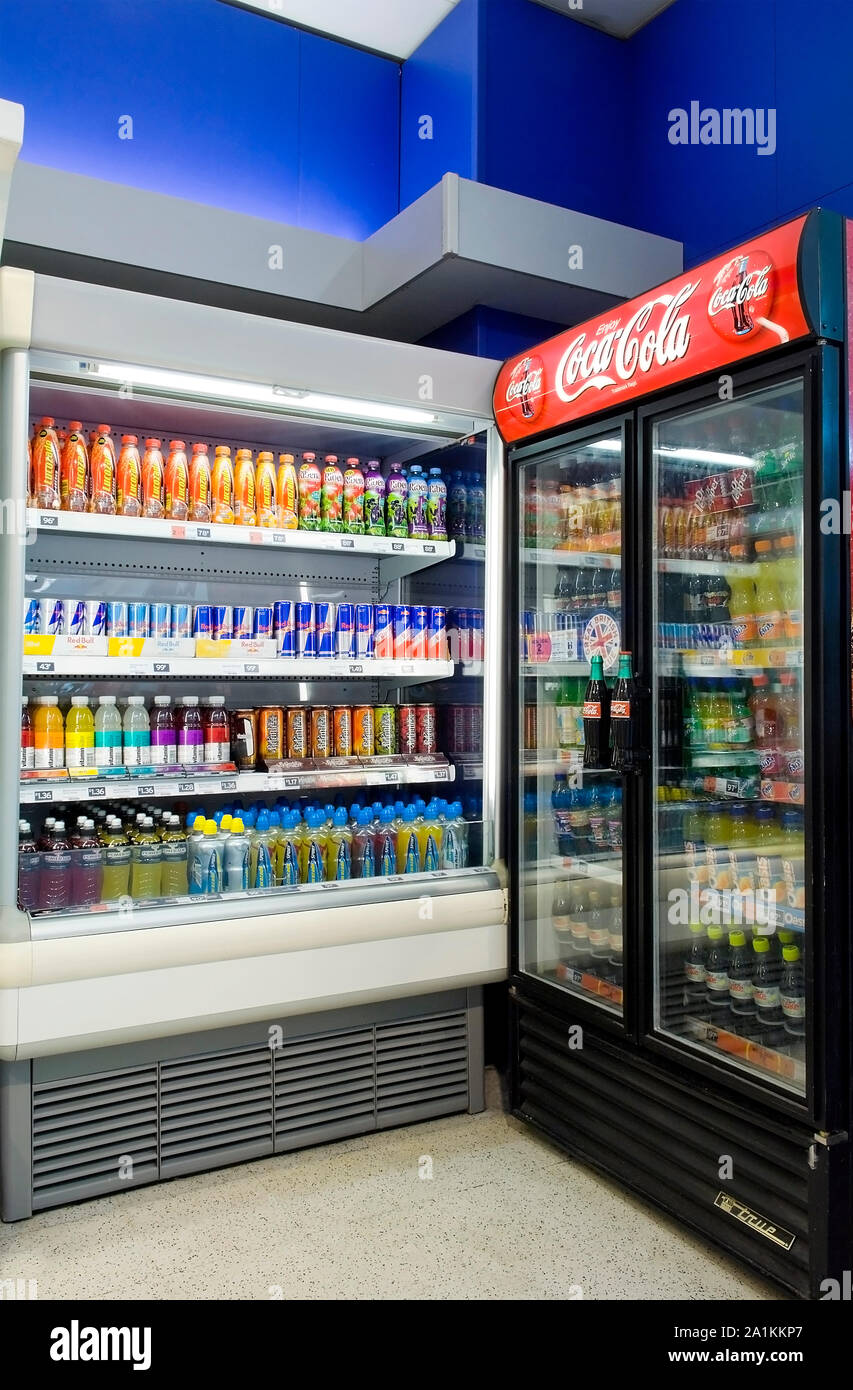 A cold drinks cabinet in a supermarket full of various fizzy and still ...