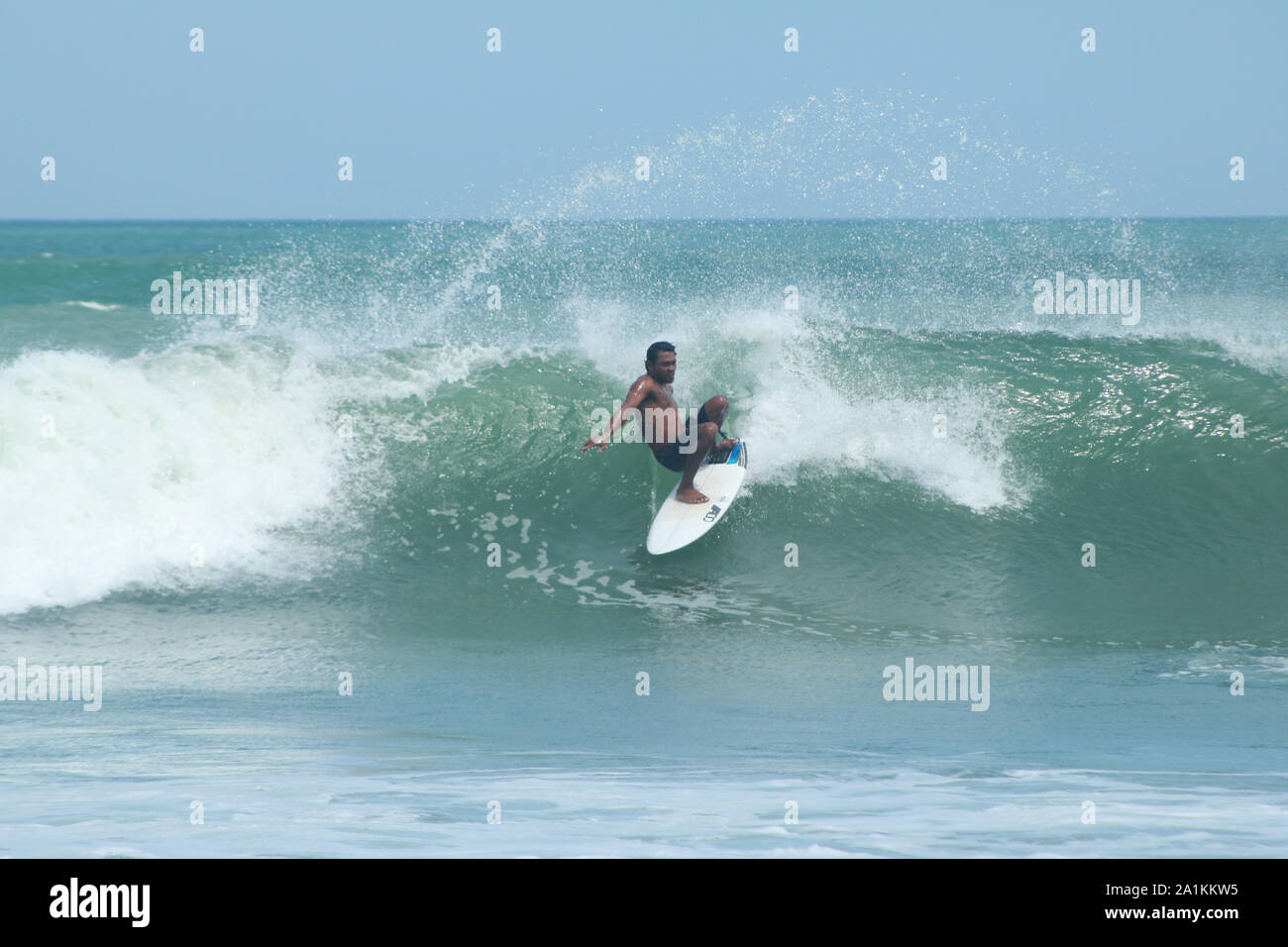 Kuta Beach, Bali 2019. Local surfer spent the day with wave Stock Photo ...