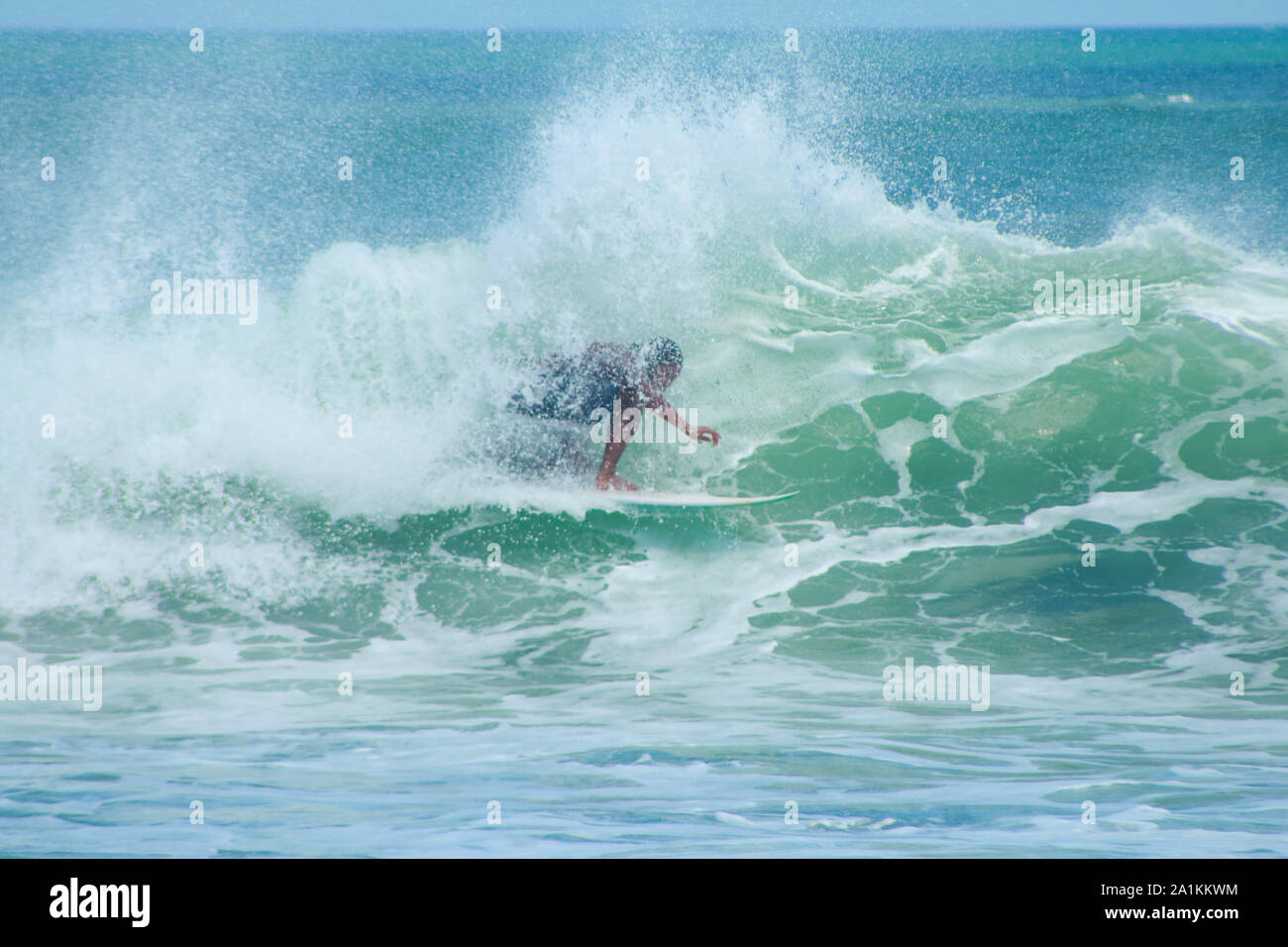 Kuta Beach, Bali 2019. Local surfer spent the day with wave Stock Photo ...