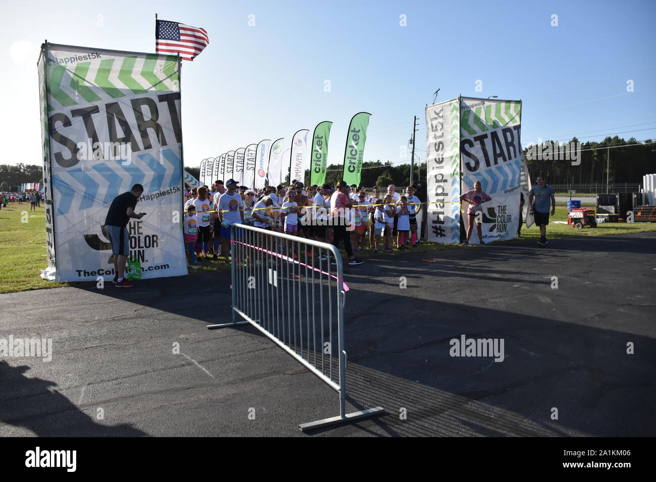 This photograph was taken at the 2019 Color Run 5K road race. These ...
