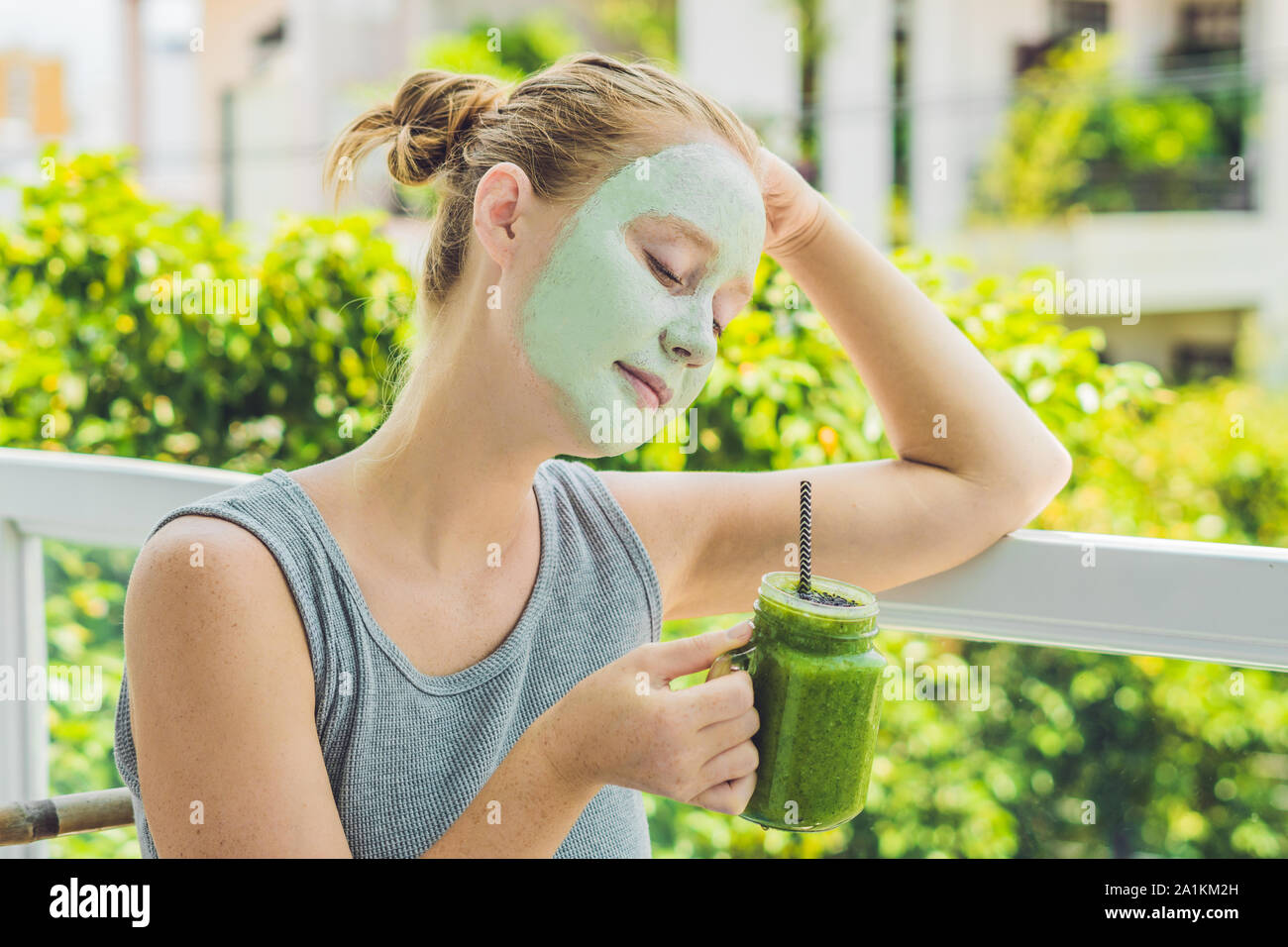 Spa Woman applying Facial green clay Mask. Beauty Treatments. Fresh ...