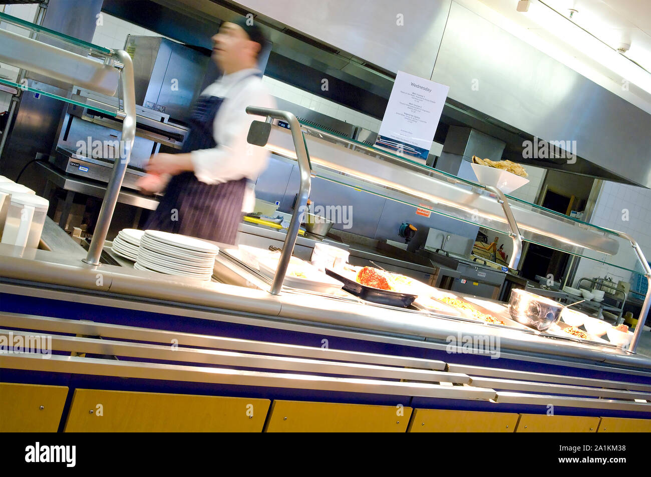 A chef preparing the food counter in a cafe Stock Photo - Alamy