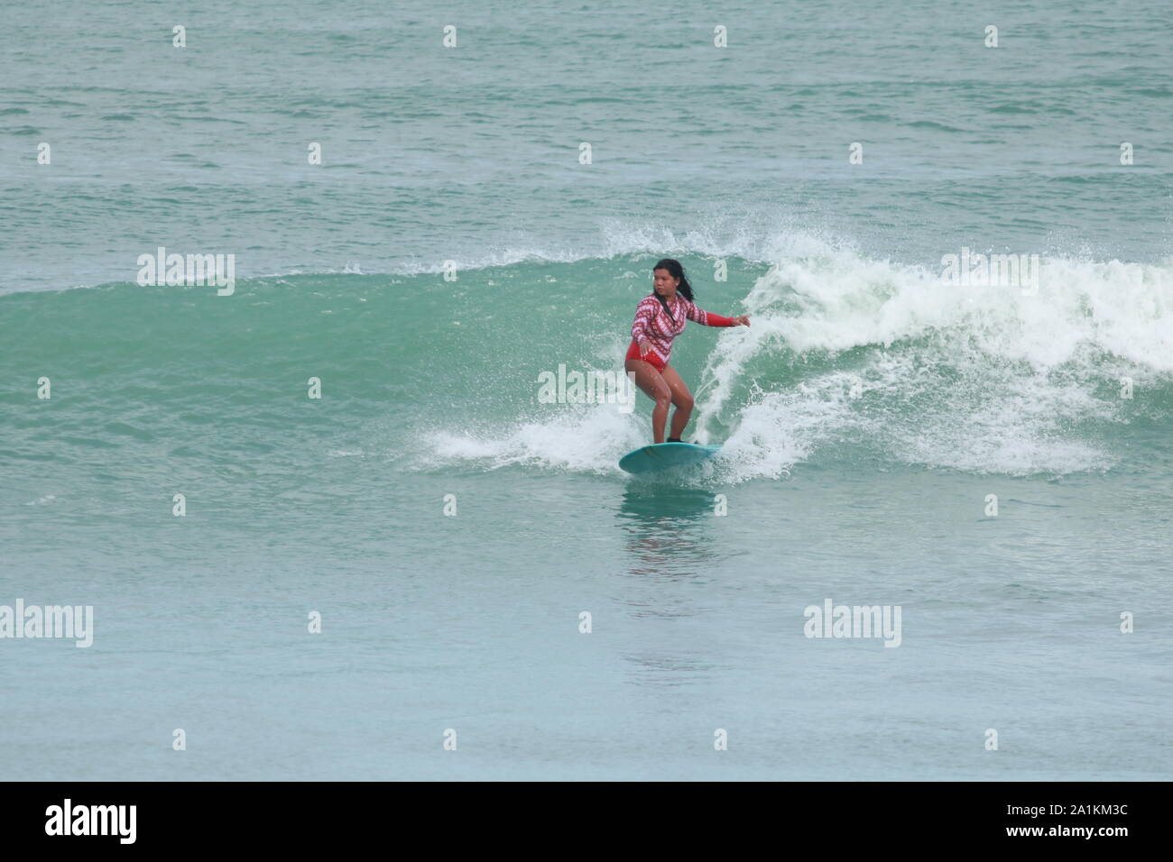 Kuta Beach, Bali 2019. Local surfer spent the day with wave Stock Photo ...