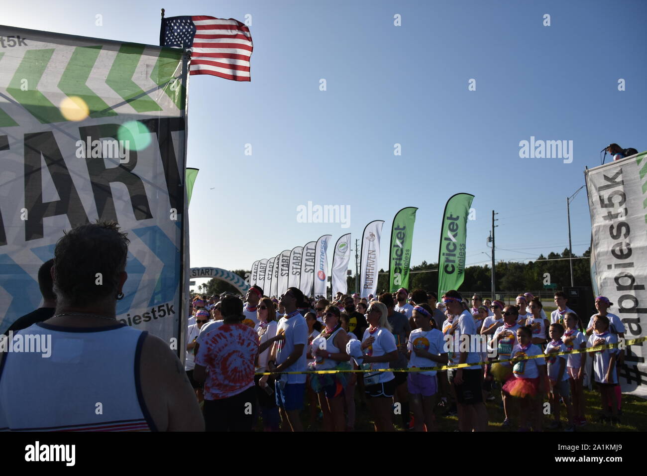 This photograph was taken at the 2019 Color Run 5K road race. These ...