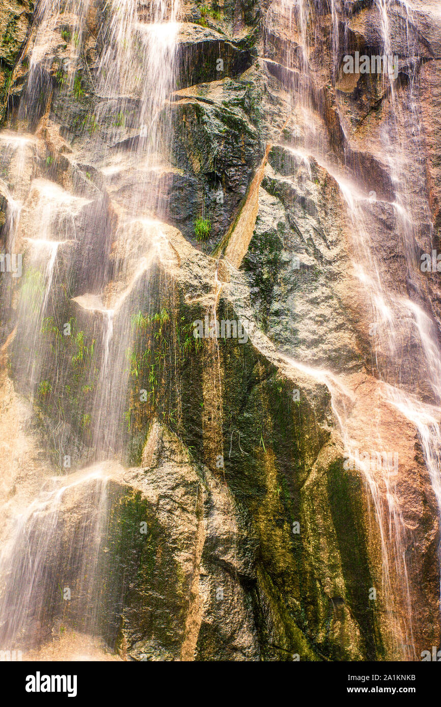 Waterfall Landscape with water falling from the top of the mountain ...