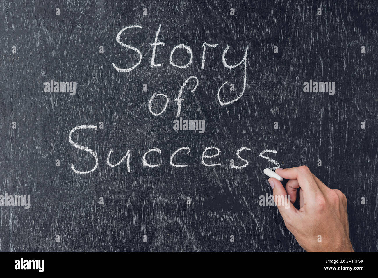 Success stories written on the blackboard using chalk Stock Photo - Alamy