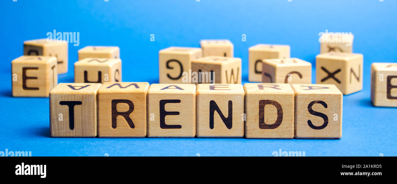 Wooden blocks with the word Trends. Popular and relevant topics. New ...