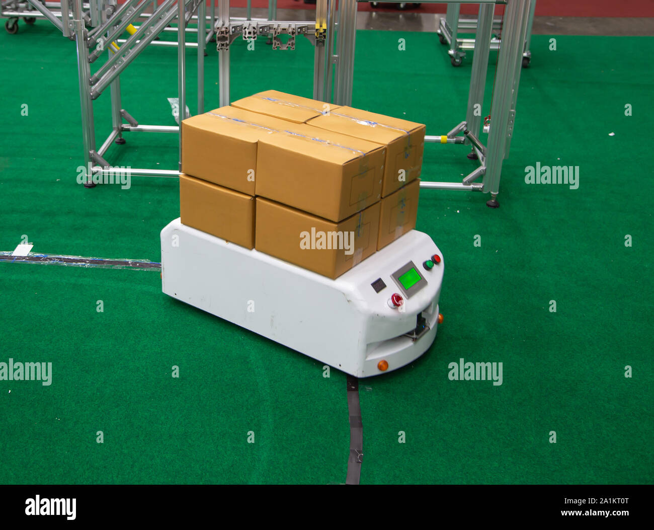 Robot carry cardboard in modern warehouse logistic Stock Photo - Alamy