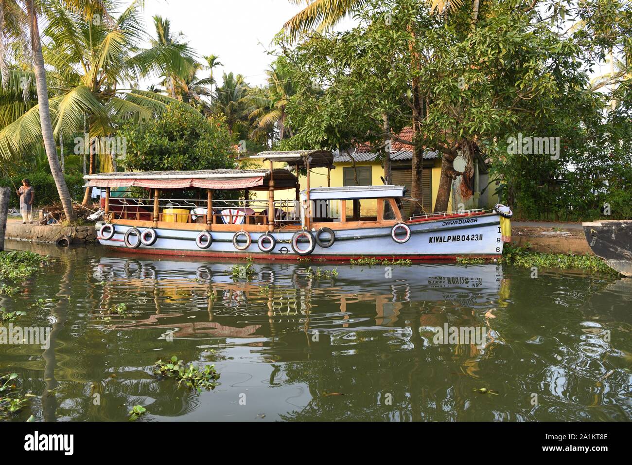 Kerala backwaters. Small tourist boat in the backwater canals in Kerala ...