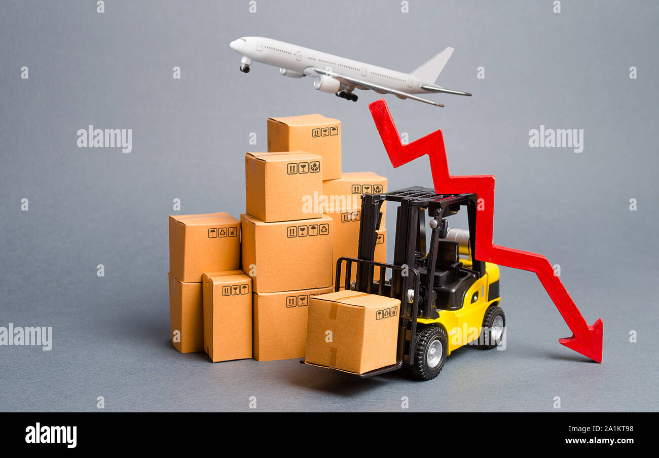 Cargo airplane, forklift truck with cardboard boxes and a red arrow ...