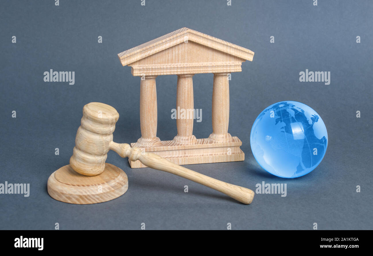 Courthouse, gavel and blue globe planet earth. International Court ...