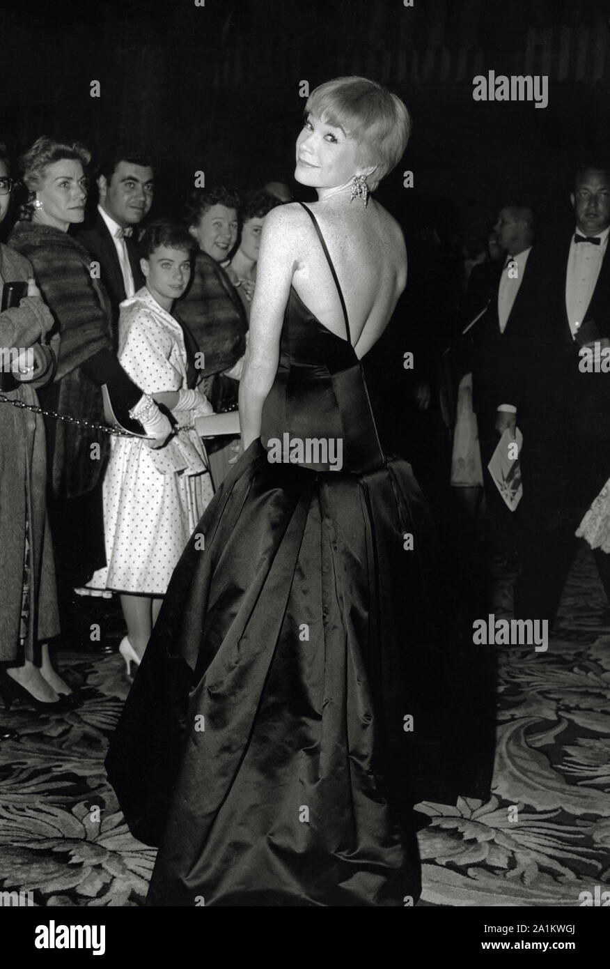 Shirley Maclaine in a black evening dress at a formal event, circa 1962 ...