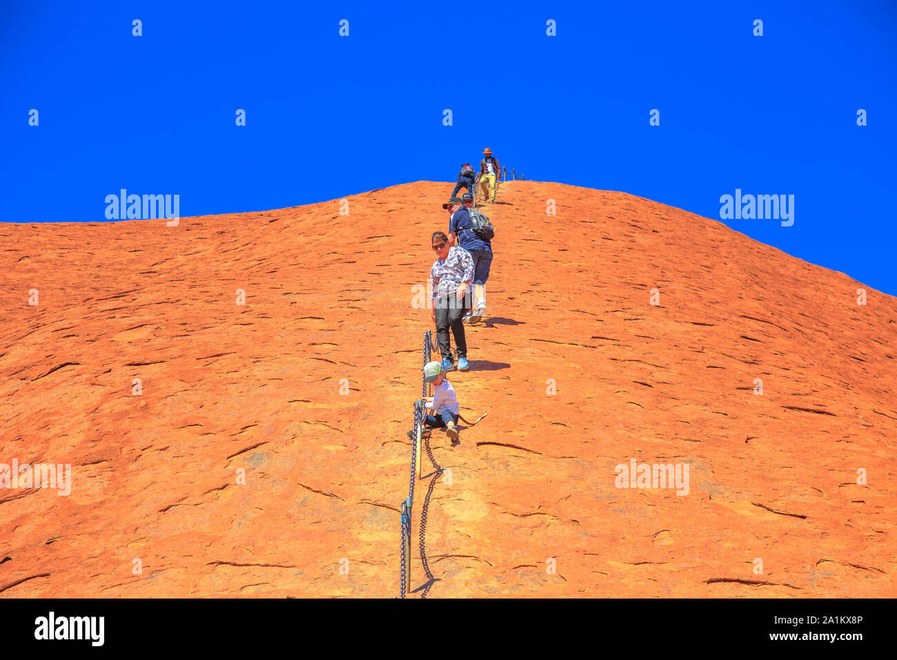 People climbing uluru hi-res stock photography and images - Alamy