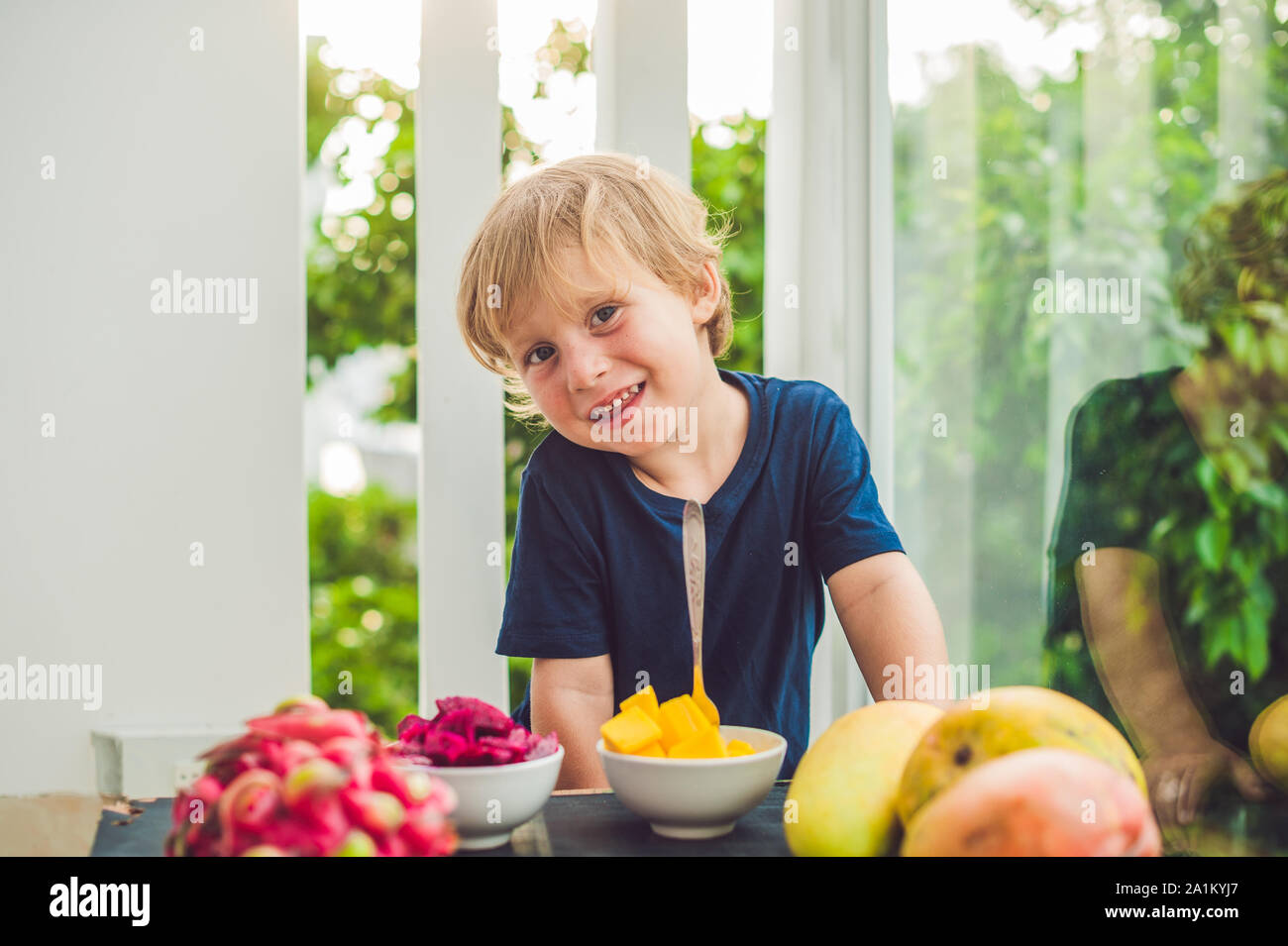 Mango boy hi-res stock photography and images - Alamy