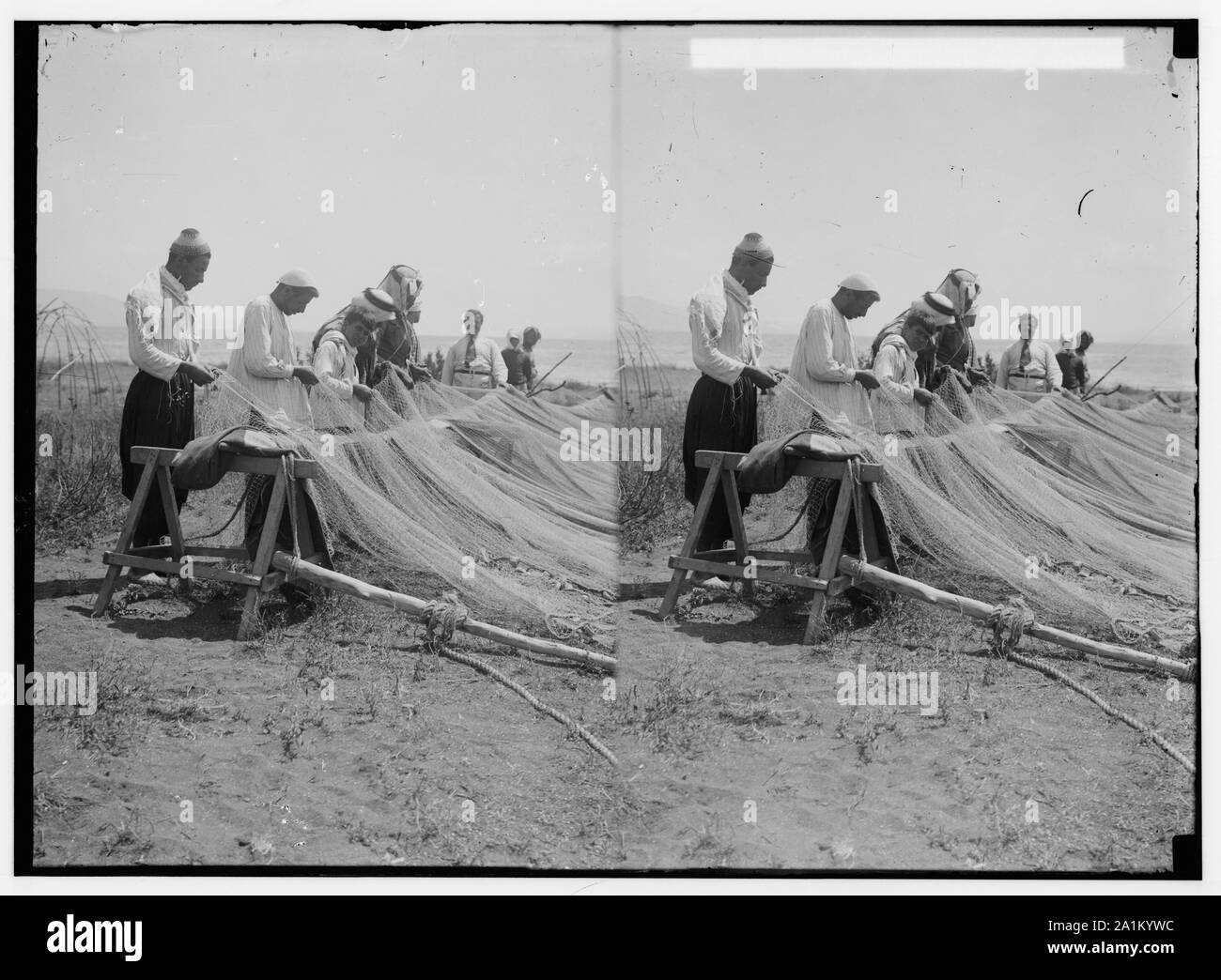 Nets mending Black and White Stock Photos & Images - Alamy