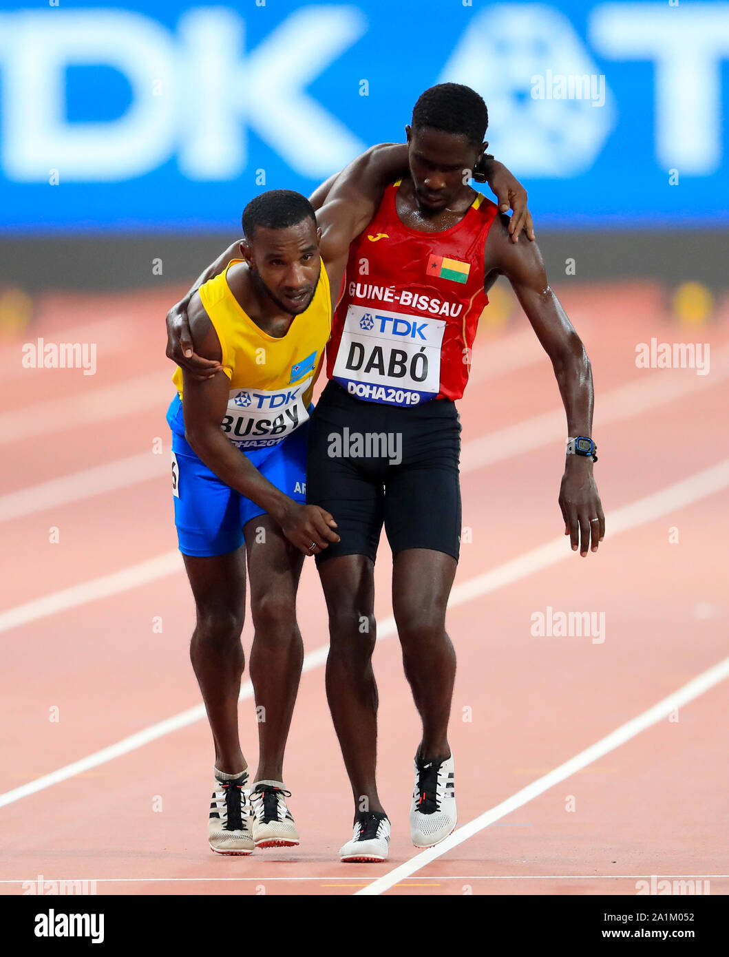 Guinea-Bissau's Braima Suncar Dabo carries Aruba's Jonathan Busby over ...