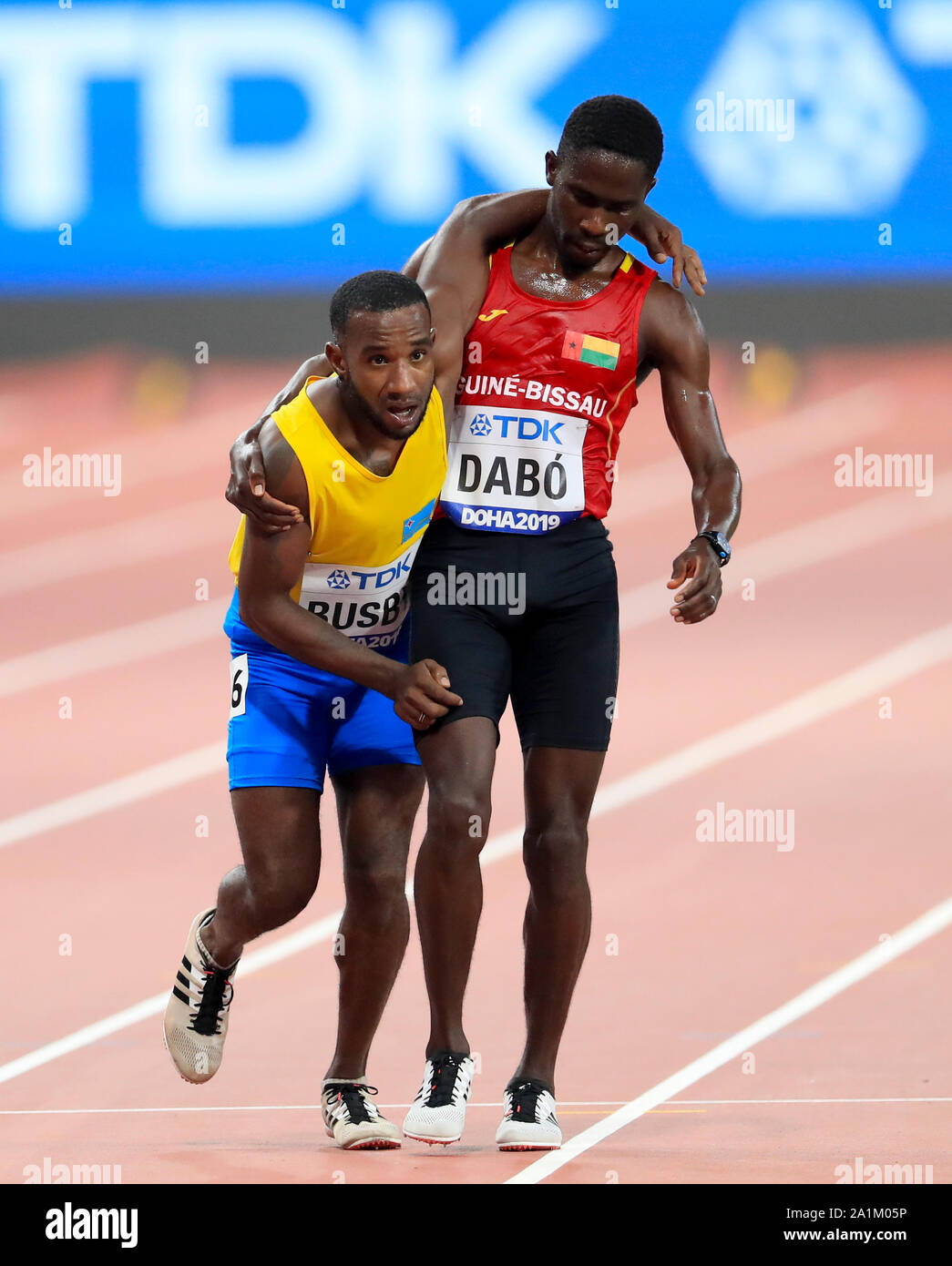 Guinea-Bissau's Braima Suncar Dabo carries Aruba's Jonathan Busby over ...