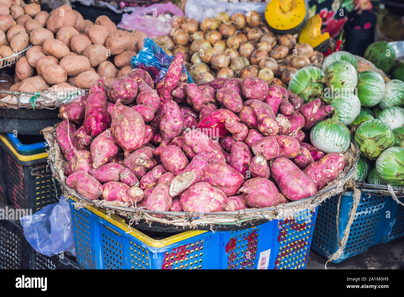 Sweet potatoes on the Vietnamese market. Asian cuisine concept Stock ...