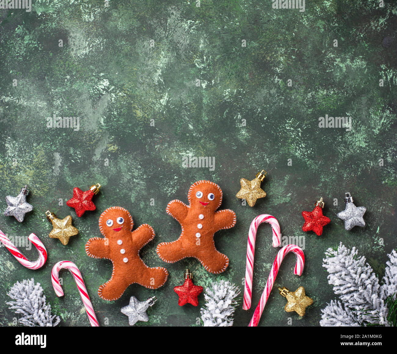 Christmas background with felt gingerbread men Stock Photo - Alamy