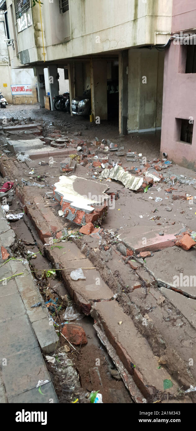 Pune, India - September 26, 2019: A wall collapsed outside a building ...